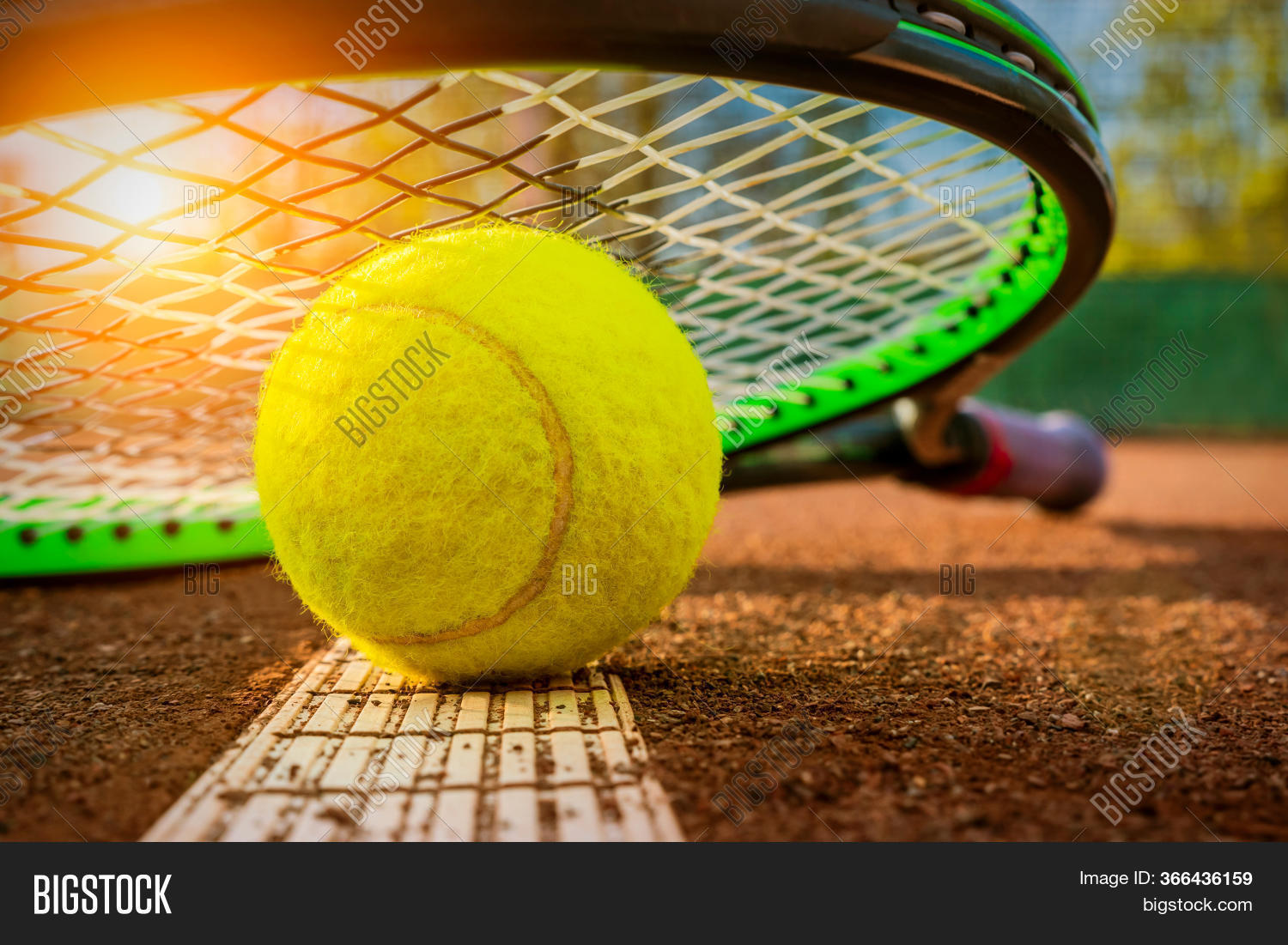 Tennis Racket And Ball On Court
