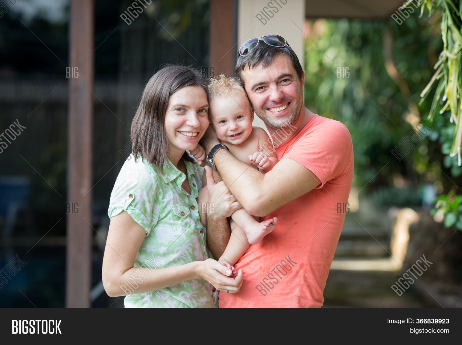 Mom Dad Hug Baby Image & Photo (Free Trial) | Bigstock