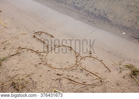 Sos Letters Sand On Image & Photo (Free Trial) | Bigstock