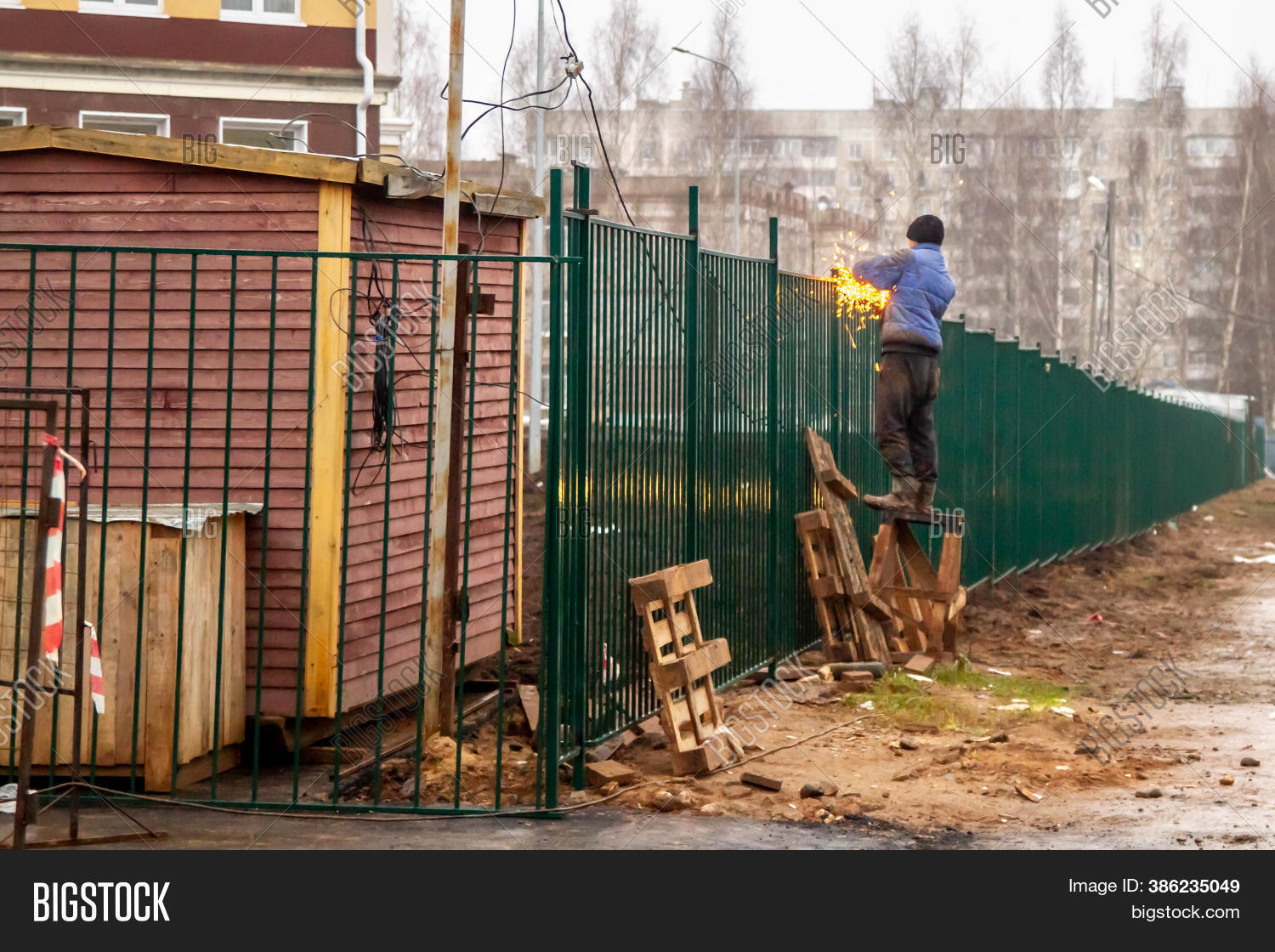 Man Cuts Metal Fence Image & Photo (Free Trial) | Bigstock