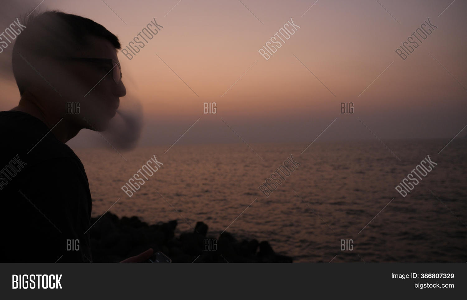 Guy Sunset Smokes E- Image & Photo (Free Trial) | Bigstock