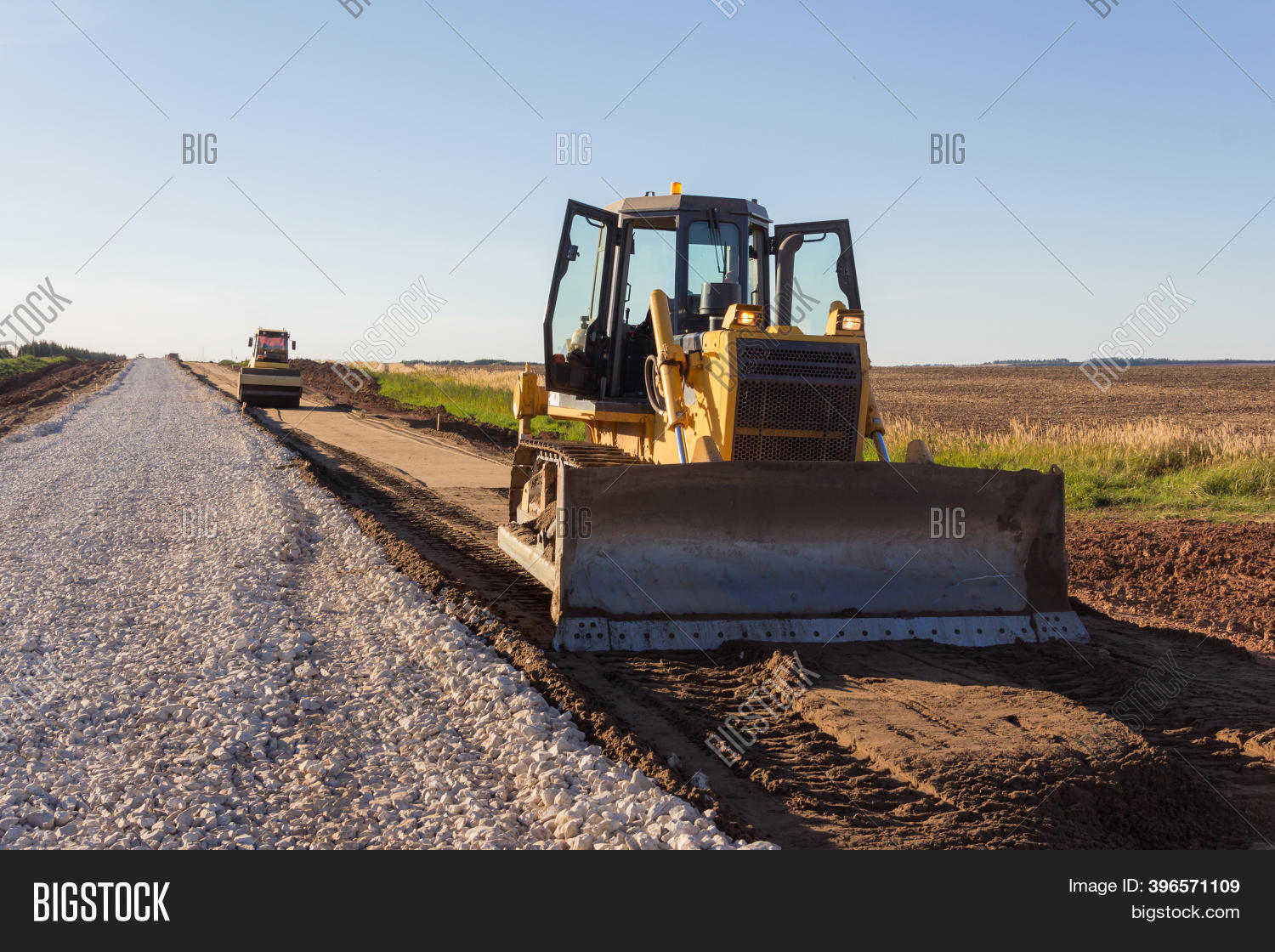 Bulldozer During Road Image & Photo (Free Trial) | Bigstock