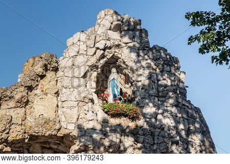 Stock Photo The Statue Of The Virgin Mary In The Grotto At The ...