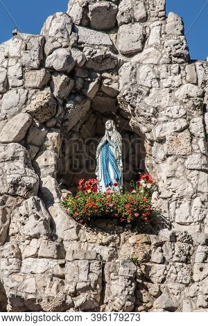 Stock Photo The Statue Of The Virgin Mary In The Grotto At The ...