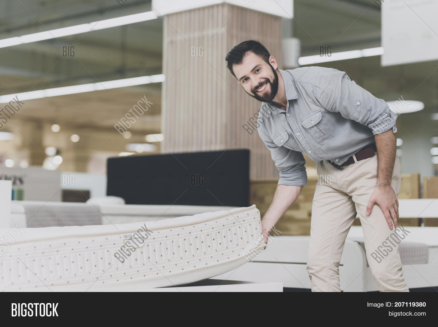 Man Inspects Mattress Image & Photo (Free Trial) | Bigstock