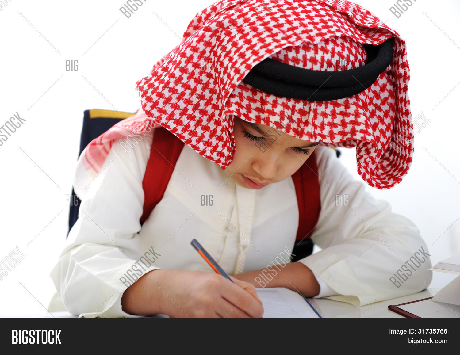 Arabian Kid Writing On Image & Photo (Free Trial) | Bigstock