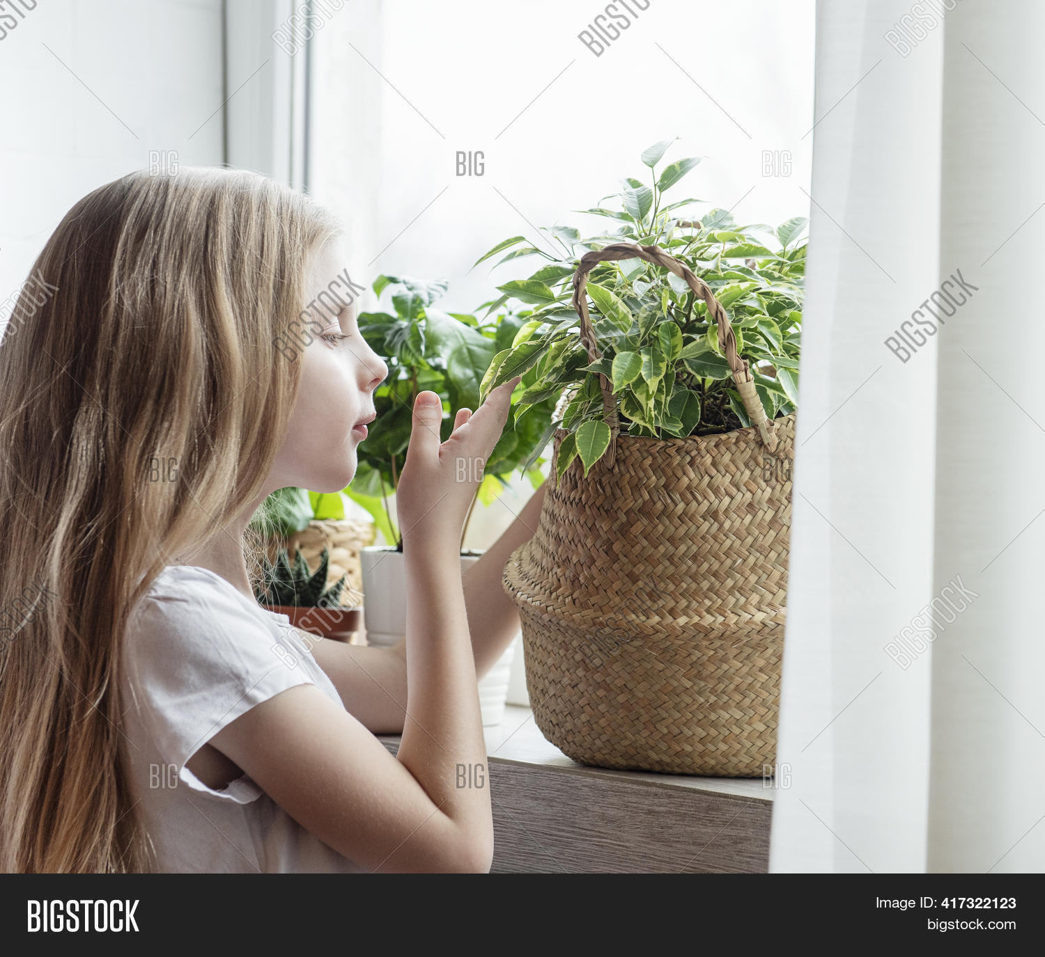 Little Girl Caring Image & Photo (Free Trial) | Bigstock