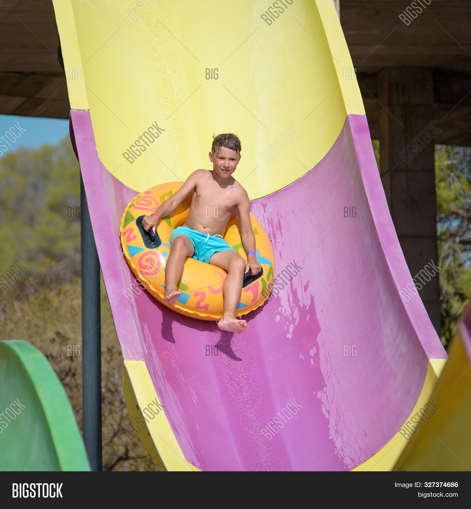 Cute Boy Sliding On Image & Photo (Free Trial) | Bigstock