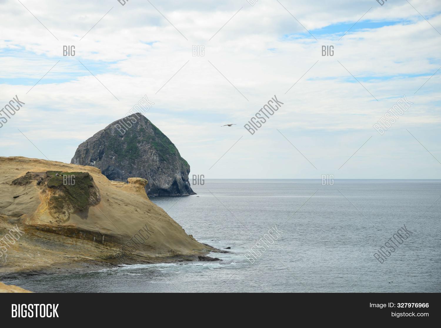 Sandy Rock Ocean Sea. Image & Photo (Free Trial) | Bigstock