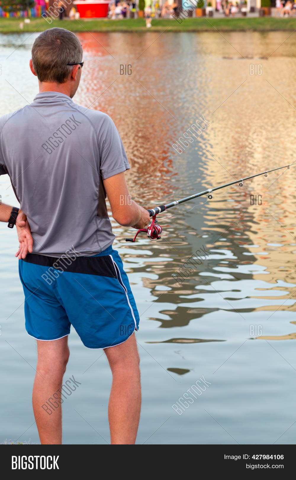 Man Catches Fish, Image & Photo (Free Trial) | Bigstock