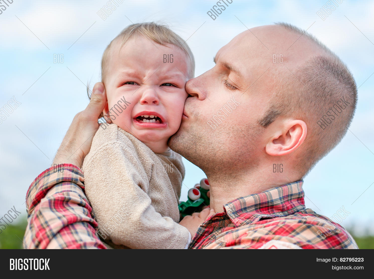 Caring Father Calms Image & Photo (Free Trial) | Bigstock