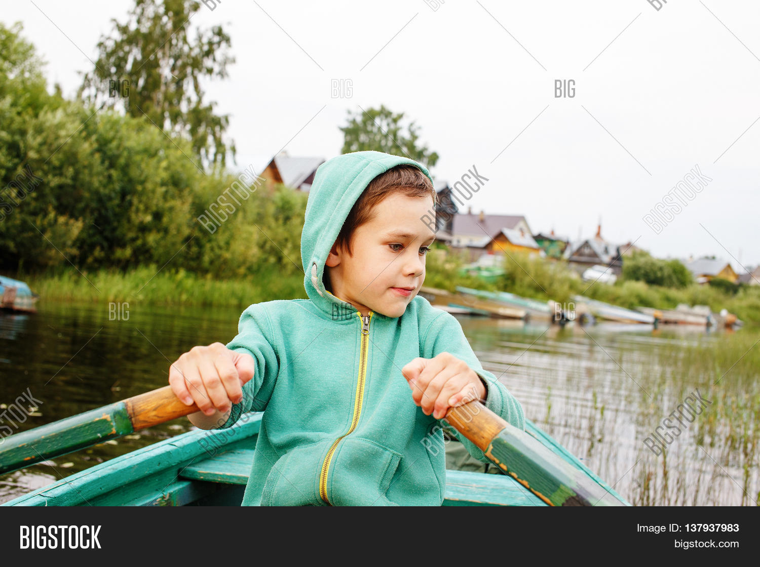 Boy Floats On Rowing Image & Photo (Free Trial) | Bigstock