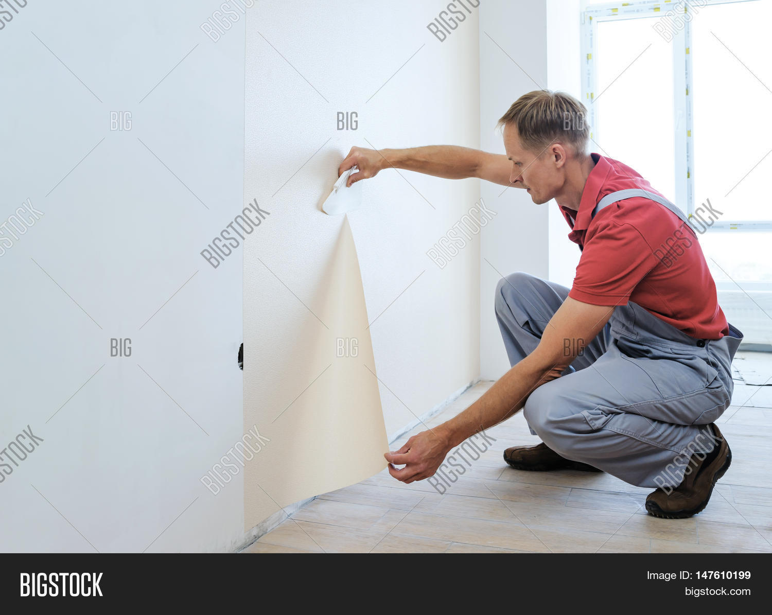 Worker Pasting Image & Photo (Free Trial) | Bigstock