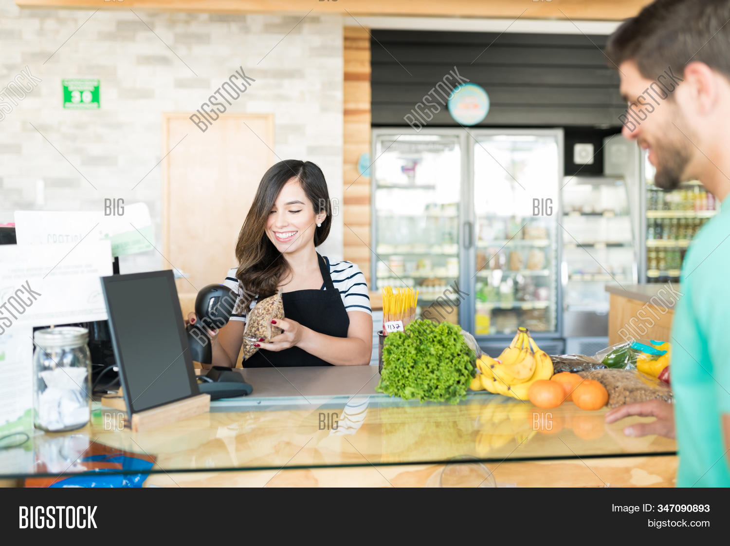 Smiling Female Cashier Image & Photo (Free Trial) | Bigstock