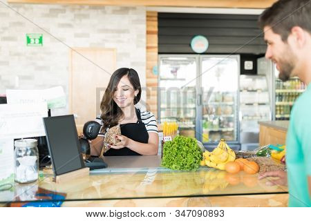 Smiling Female Cashier Image & Photo (Free Trial) | Bigstock