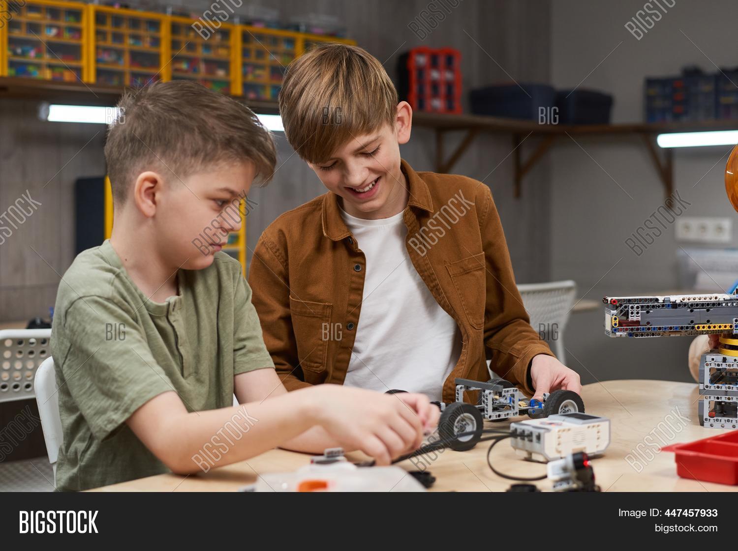 Two Boys Sitting Table Image & Photo (Free Trial) | Bigstock