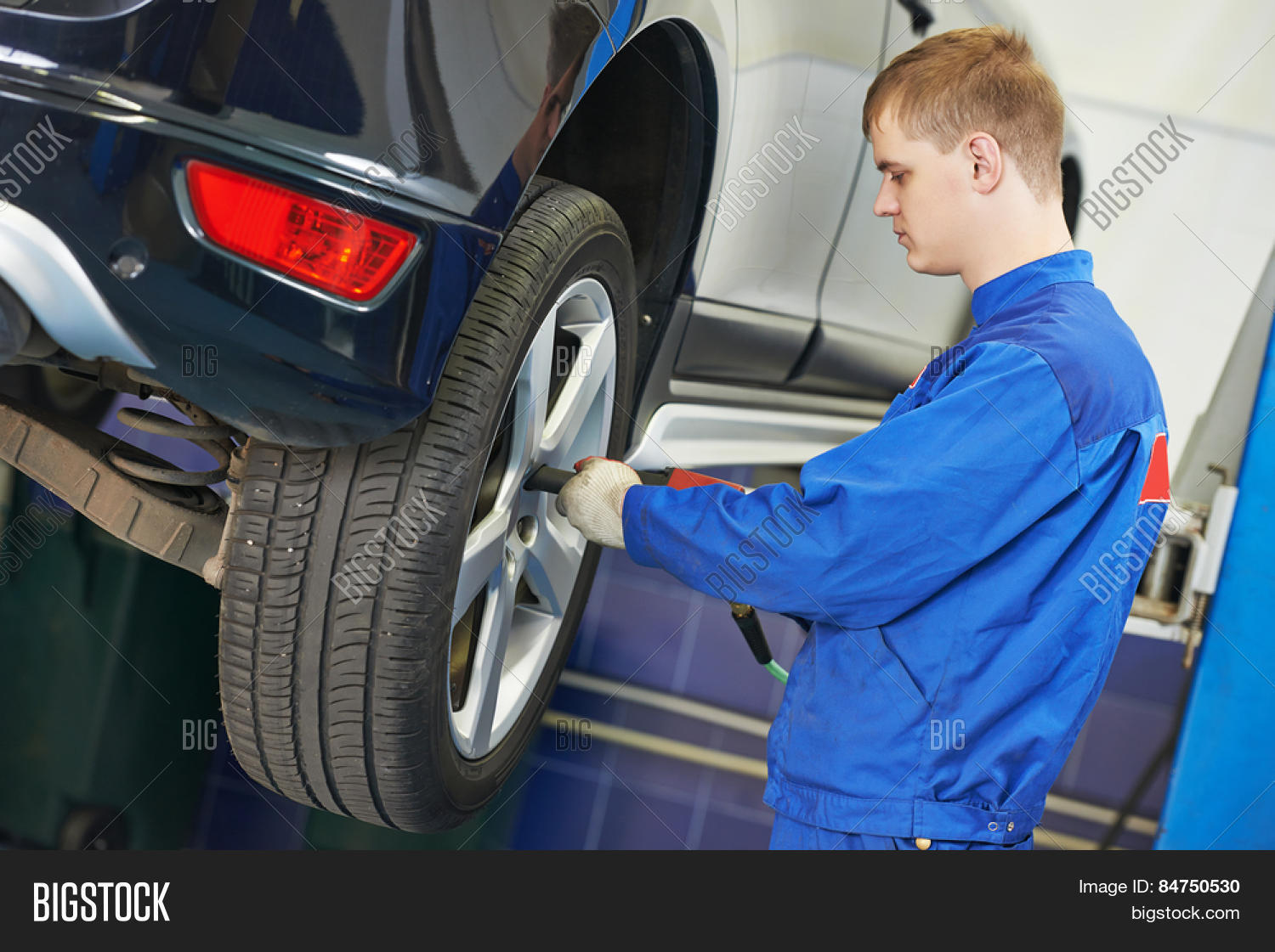 Car Mechanic Screwing Image & Photo (Free Trial) | Bigstock