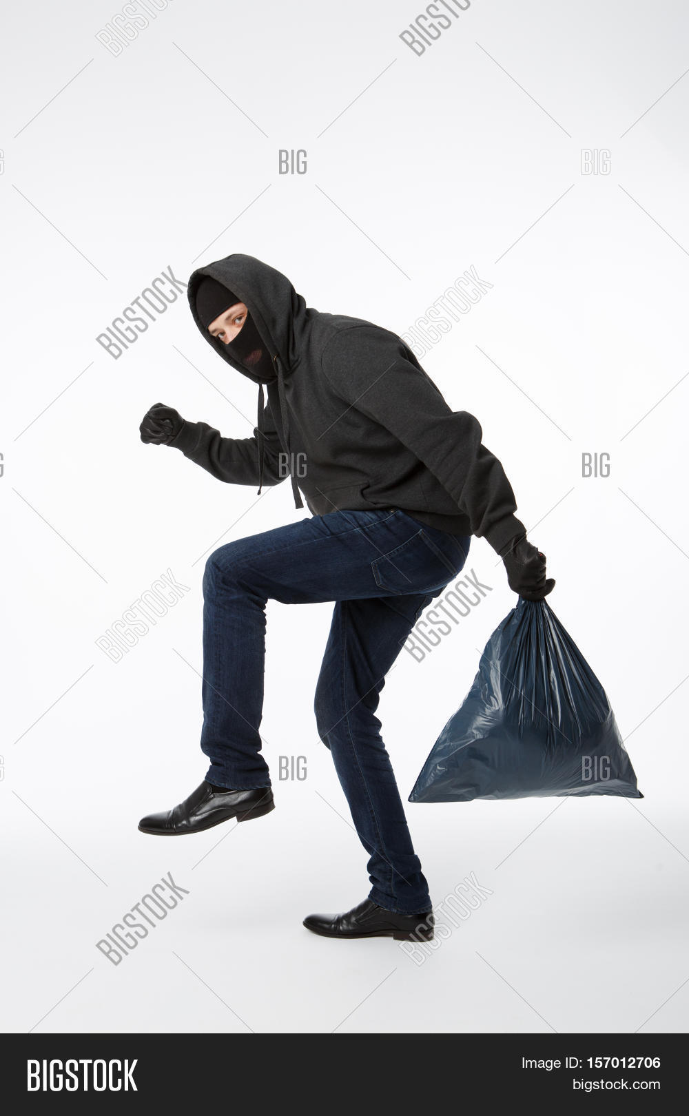 Thief Slinking Heavy Image & Photo (Free Trial) | Bigstock