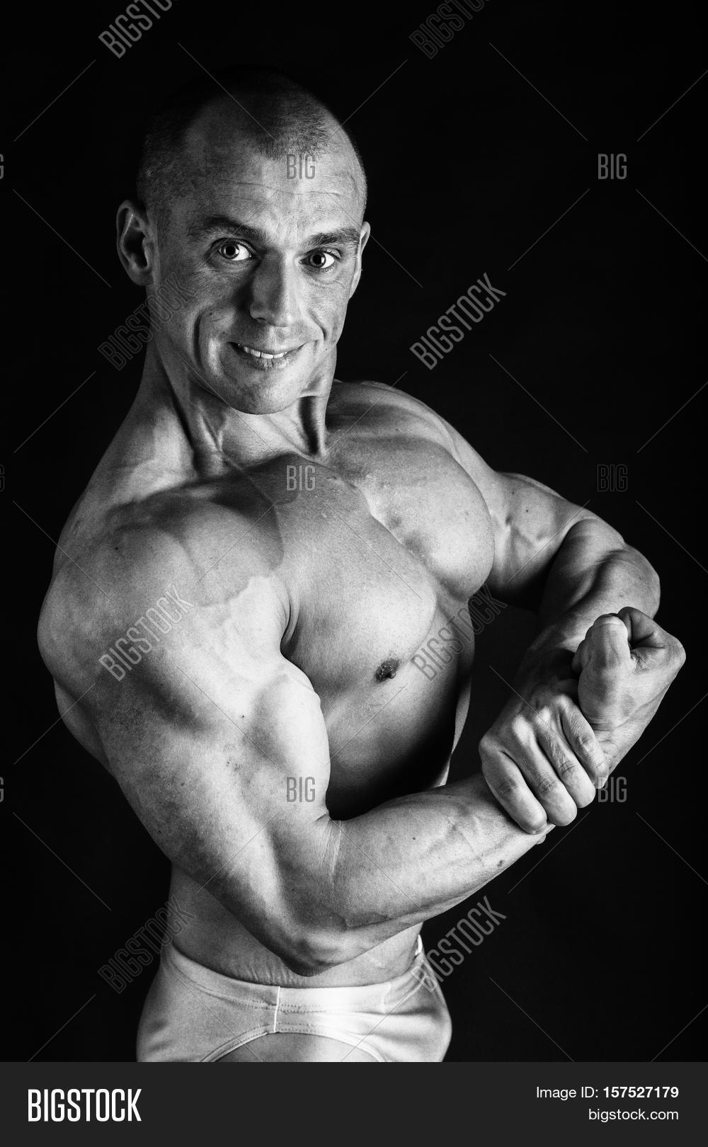 Bodybuilder Posing Image & Photo (Free Trial) | Bigstock