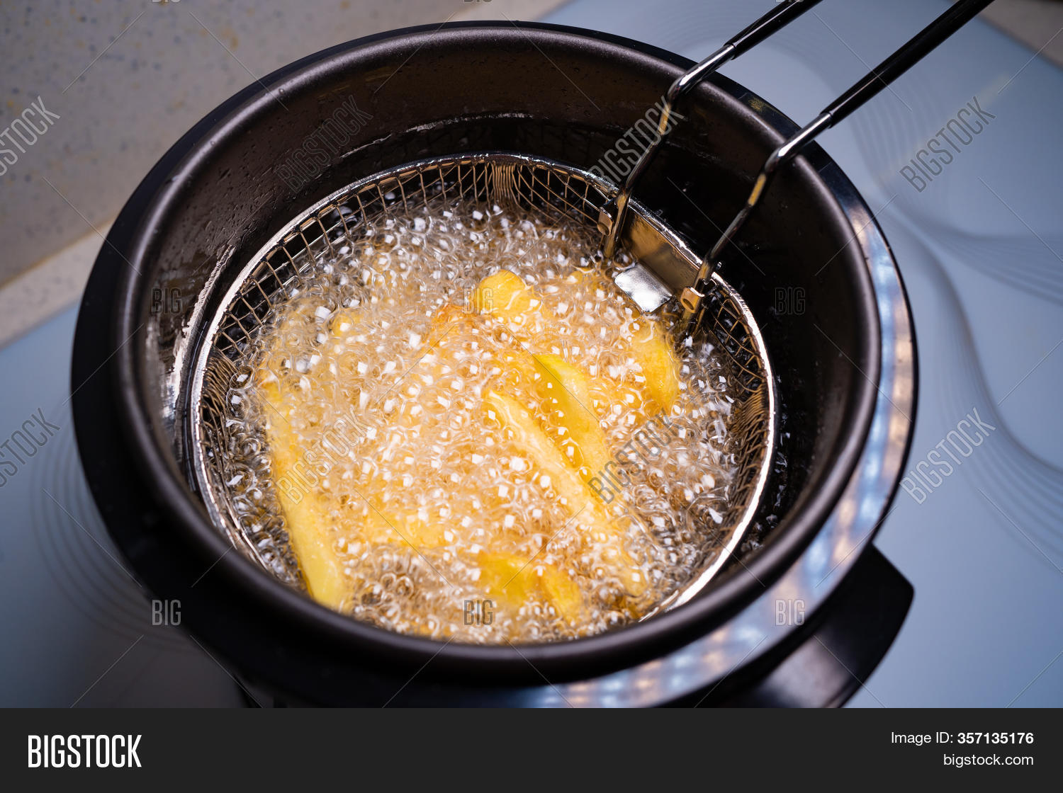 Cook French Fries. Oil Image & Photo (Free Trial) | Bigstock