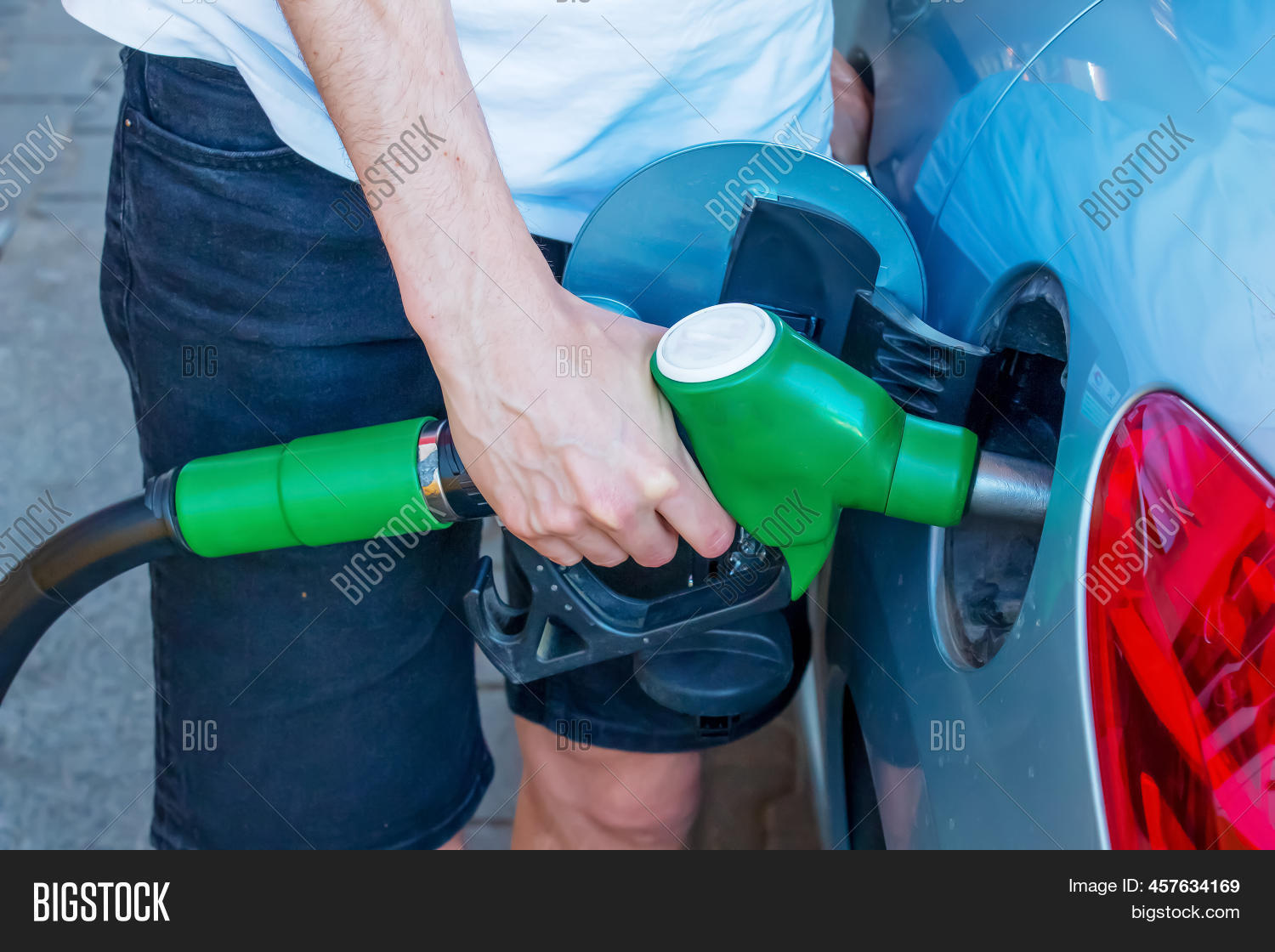 Refueling Gun Refuel Image & Photo (Free Trial) | Bigstock