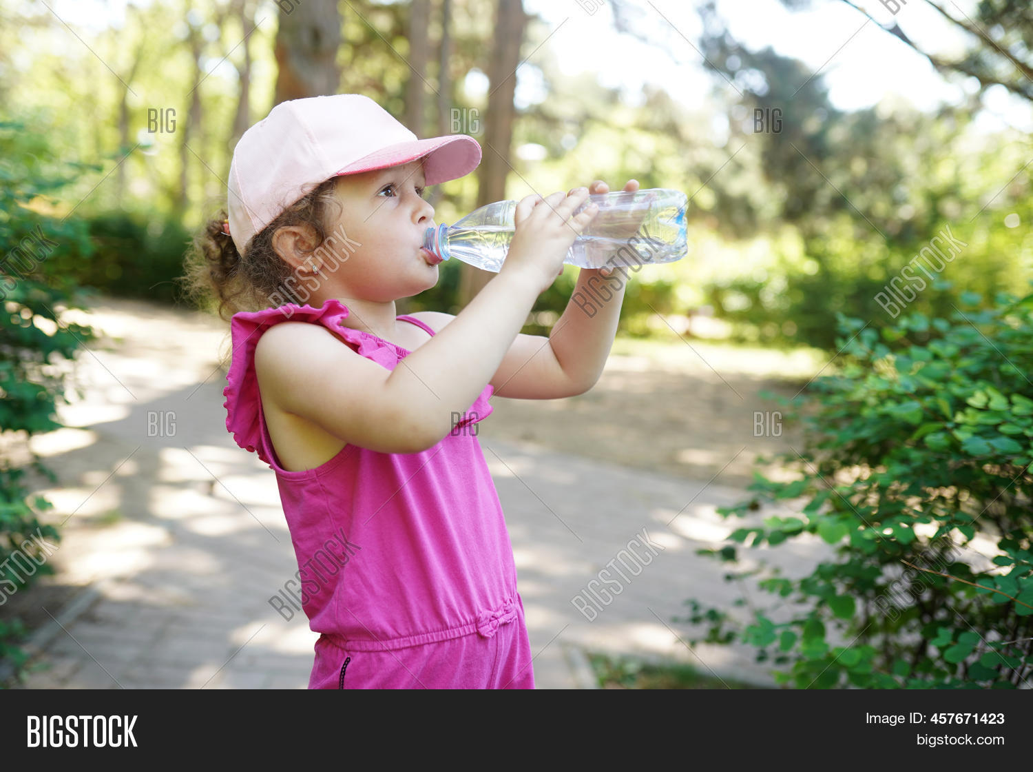 Child Girl Drinks Image & Photo (Free Trial) | Bigstock