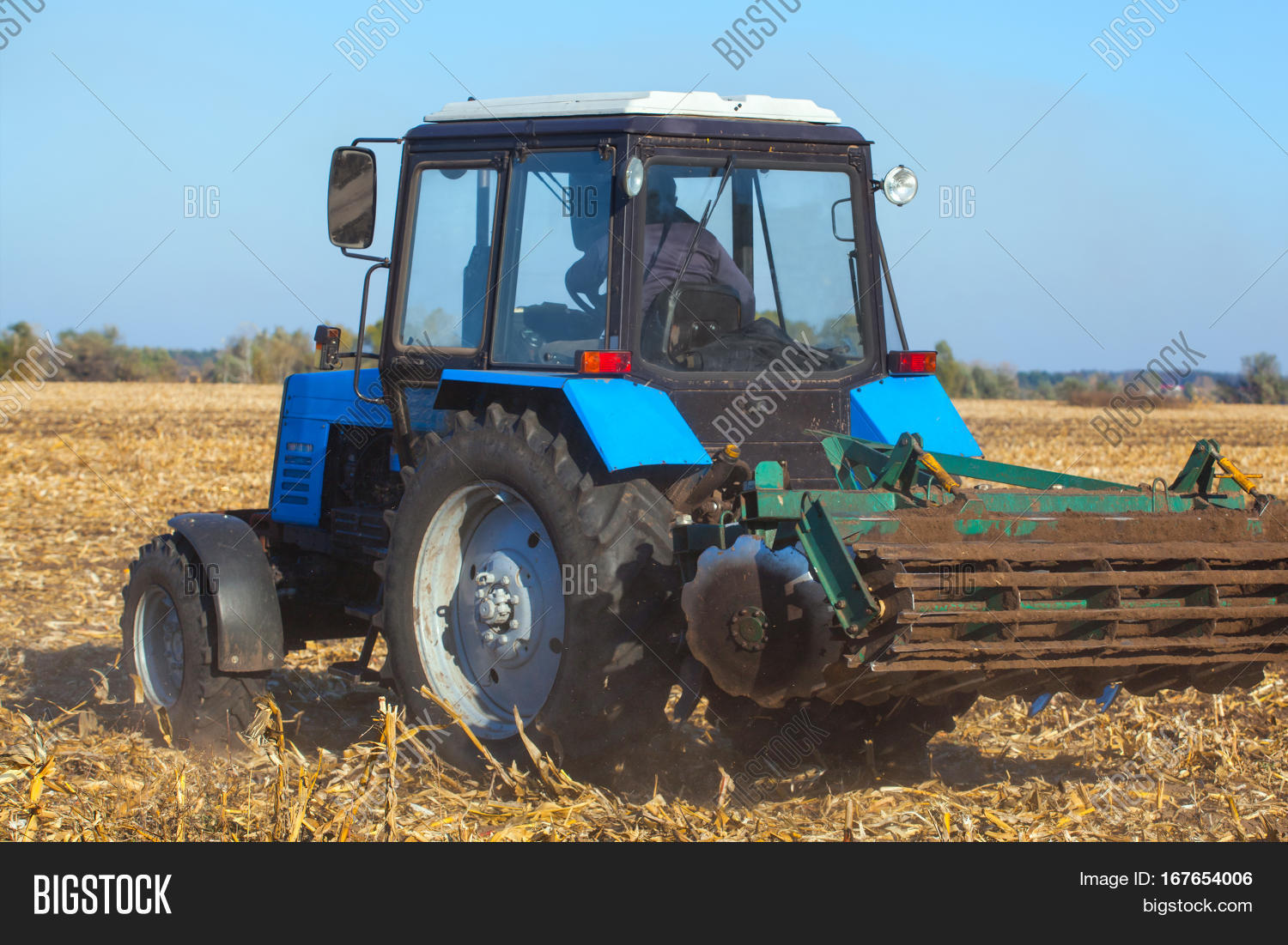 Big Blue Tractor Plows Image & Photo (Free Trial) | Bigstock