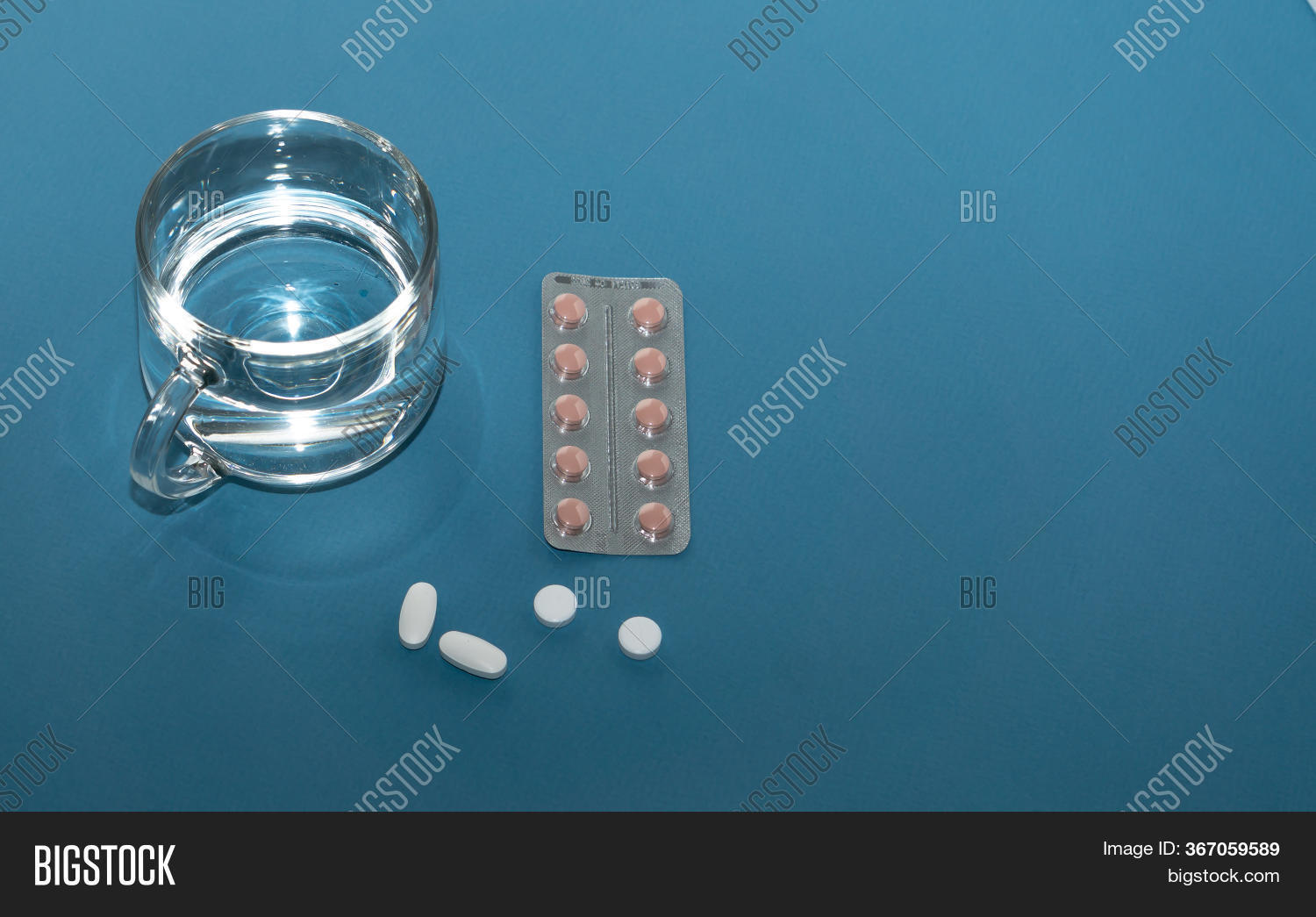 Pills Water On Table Image & Photo (Free Trial) | Bigstock
