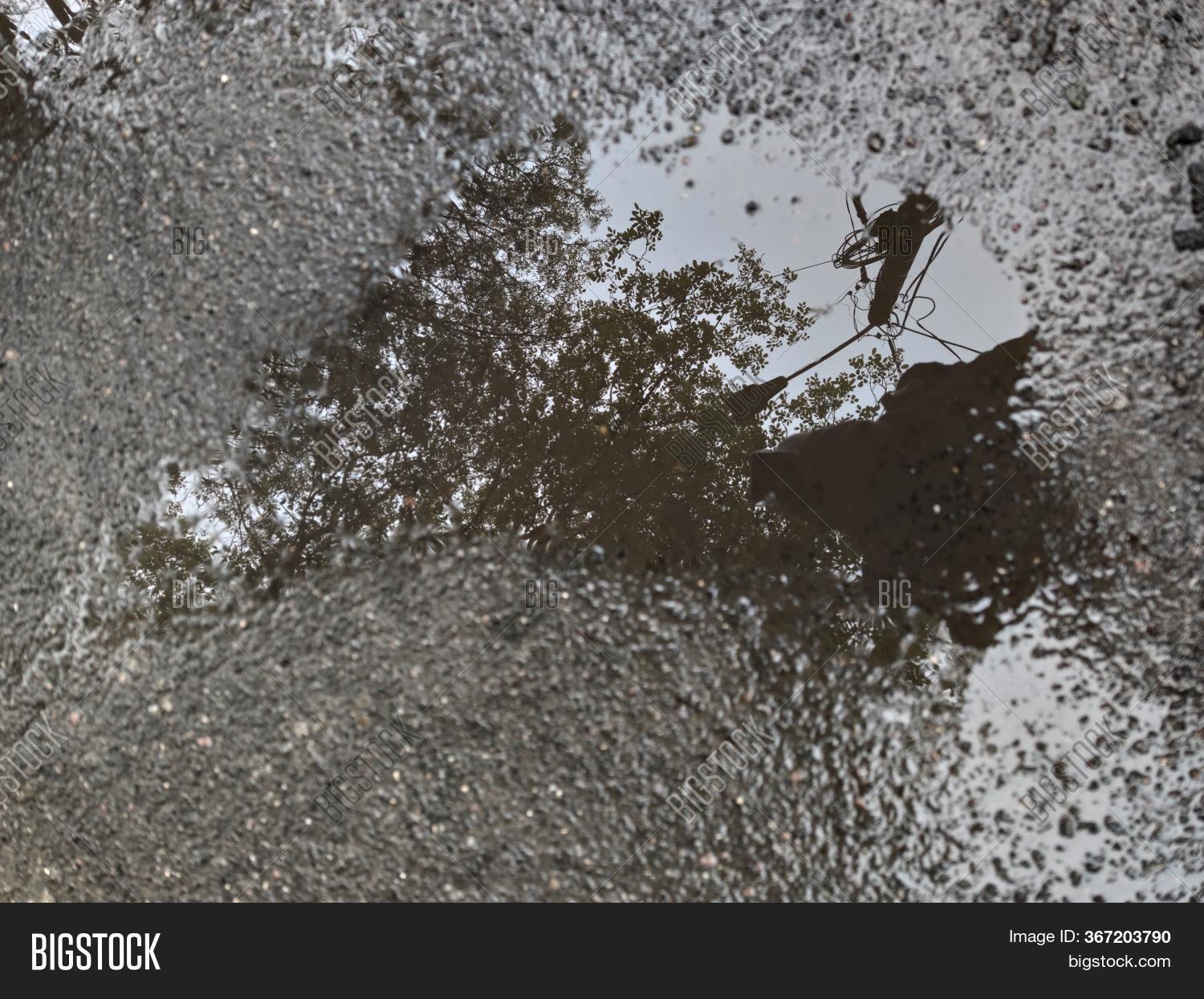 Wet Asphalt Puddle Image & Photo (Free Trial) | Bigstock