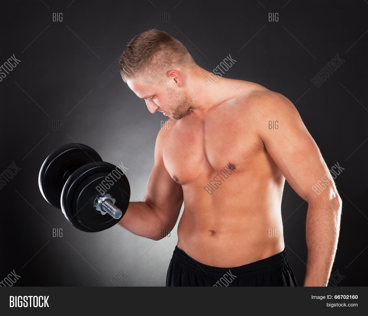 Fit Man Lifting Weights
