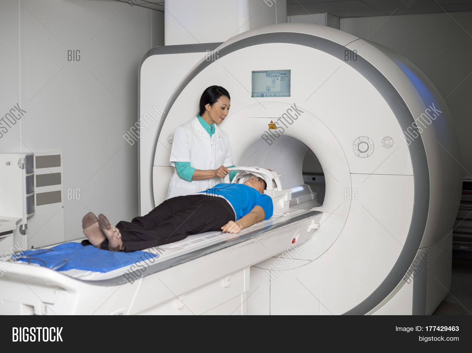 Doctor Fixing Mask Image & Photo (Free Trial) | Bigstock