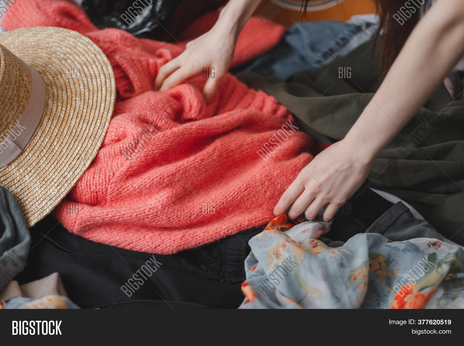 Woman Sorts Clothes Image & Photo (Free Trial) | Bigstock
