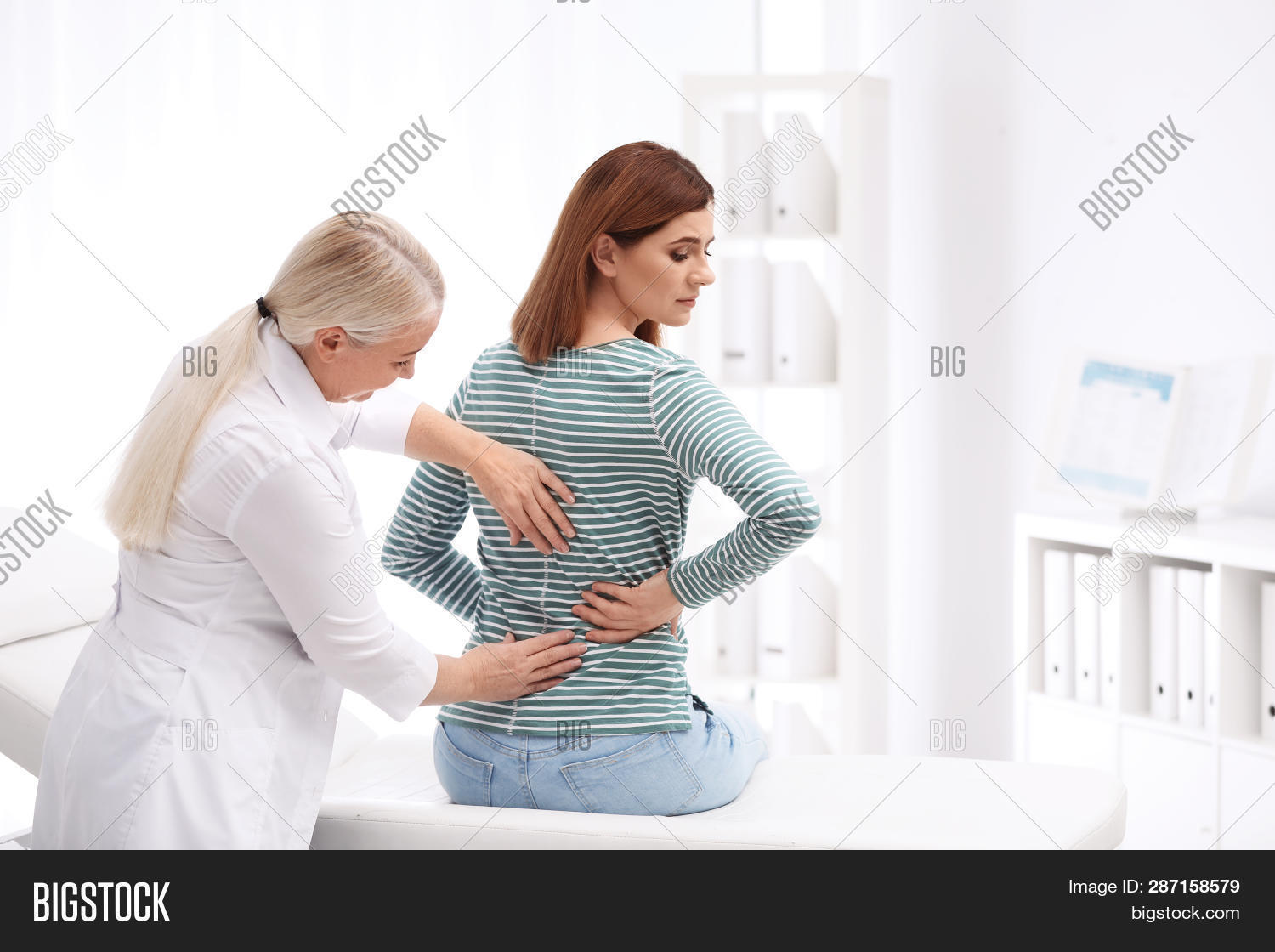Chiropractor Examining Image & Photo (Free Trial) | Bigstock