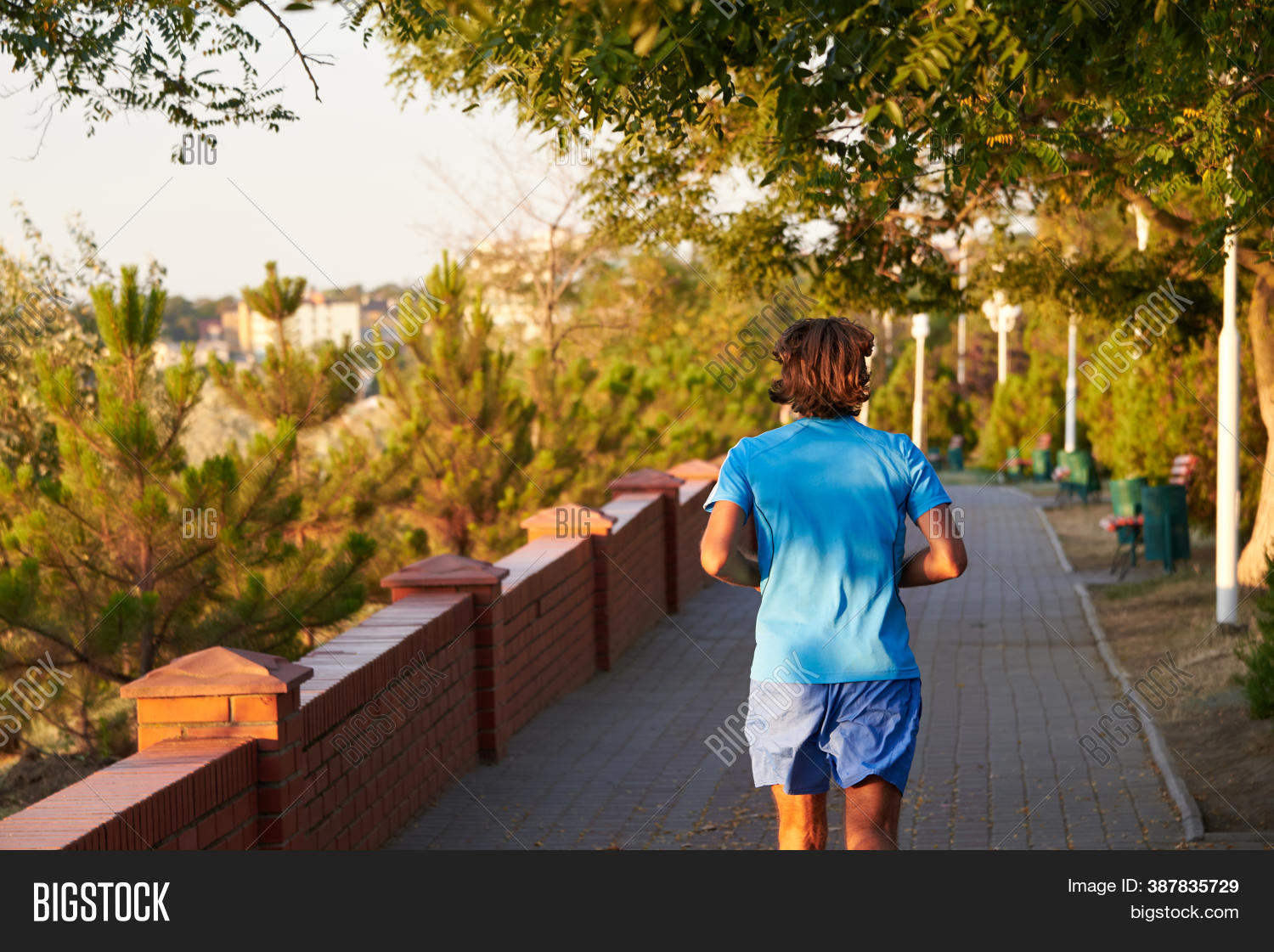 Young Man Running Park Image & Photo (Free Trial) | Bigstock