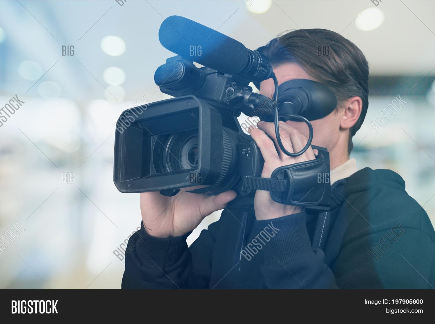 Holding Man Big Camera Image & Photo (Free Trial) | Bigstock