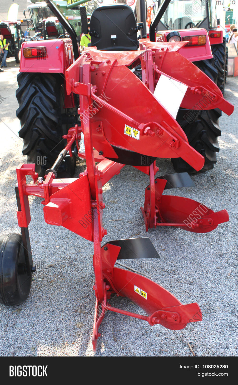 Ploughing Tractor Image & Photo (Free Trial) | Bigstock