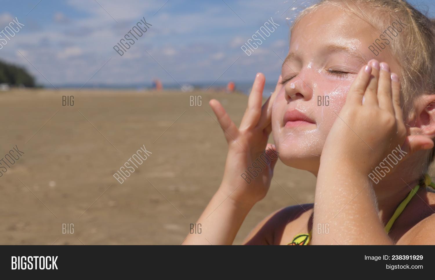 Girl Apply Sunscreen Image & Photo (Free Trial) | Bigstock