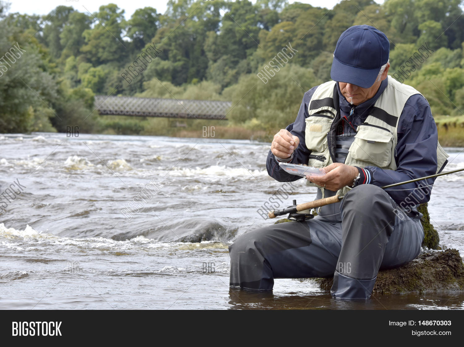 Fly-fisherman Sitting Image & Photo (Free Trial) | Bigstock