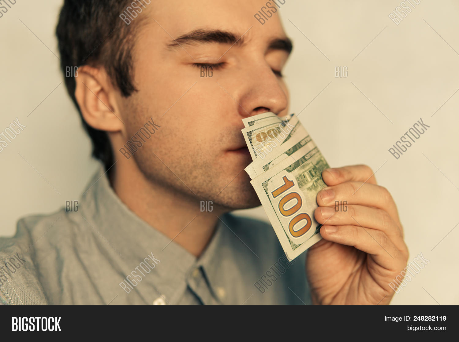 Man Sniffing Dollars. Image & Photo (Free Trial) | Bigstock