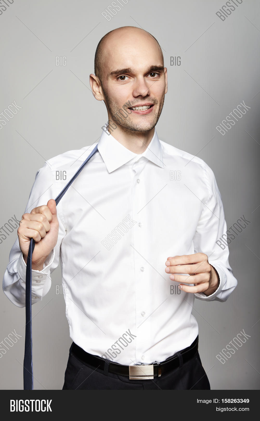 Takes Off Tie Image & Photo (Free Trial) | Bigstock