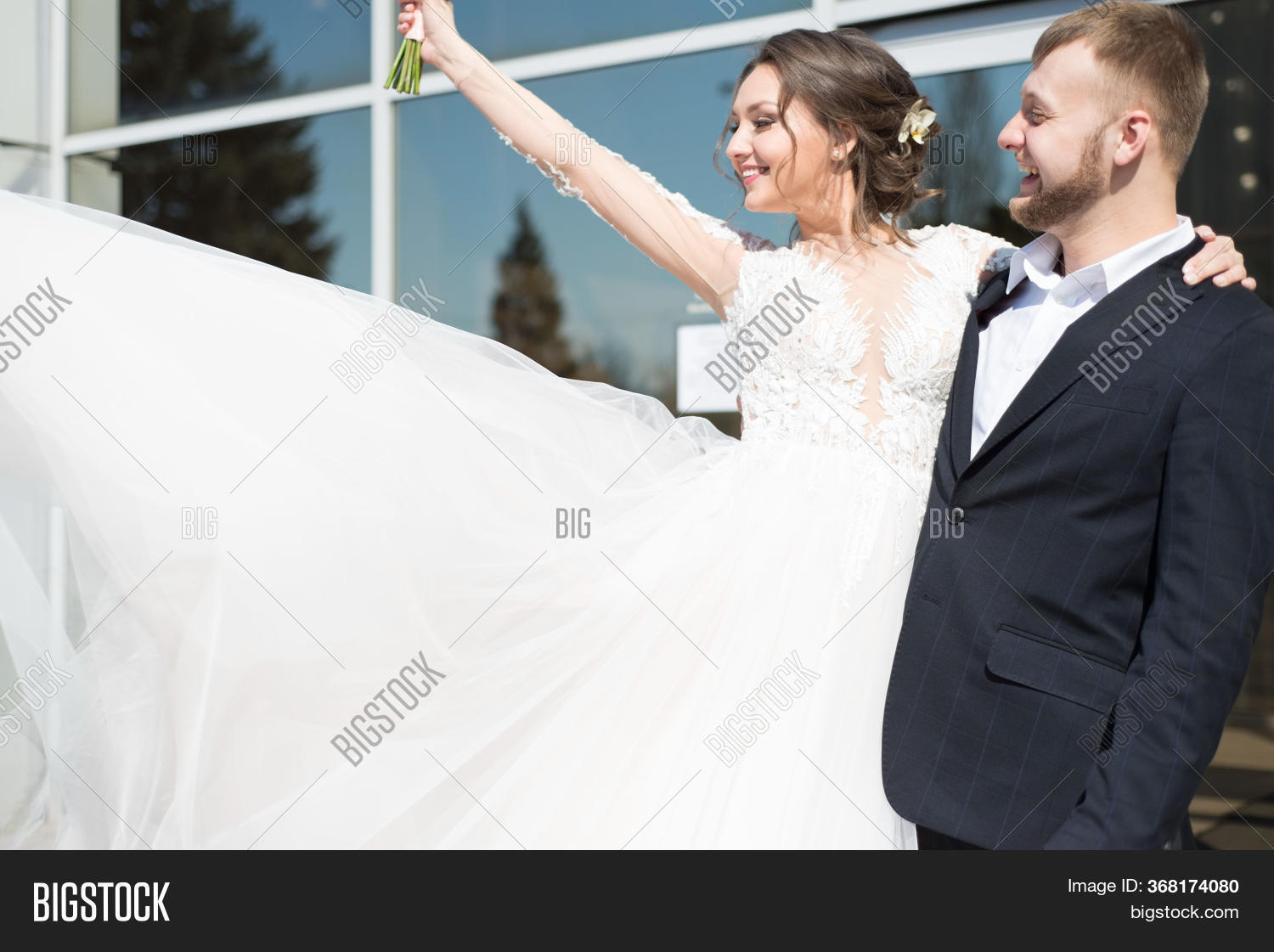 Bride Lifts Bouquet , Image & Photo (Free Trial) | Bigstock