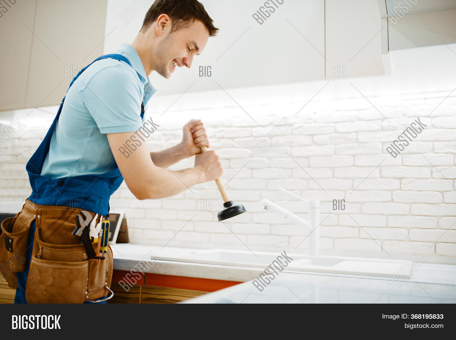 Male Plumber Uniform Image & Photo (Free Trial) | Bigstock