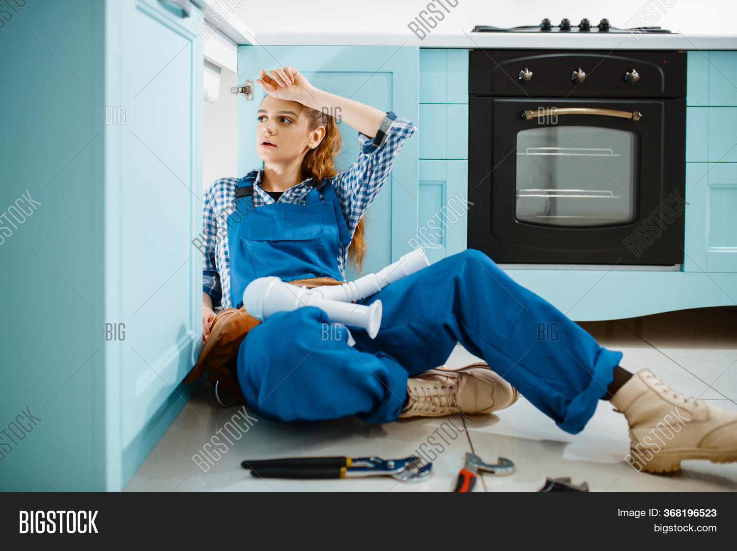 Tired Female Plumber Image & Photo (Free Trial) | Bigstock