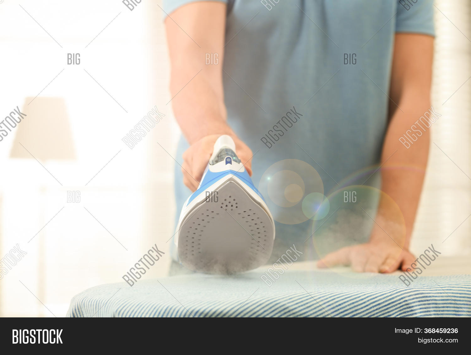 Man Ironing Laundry On Image & Photo (Free Trial) | Bigstock