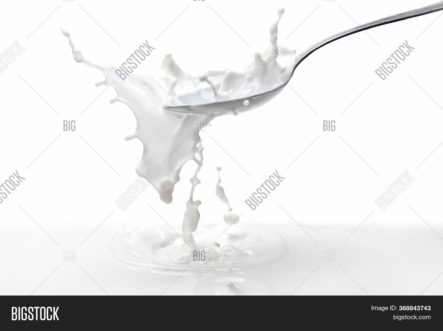 Milk Splash Spoon Milk Image & Photo (Free Trial) | Bigstock