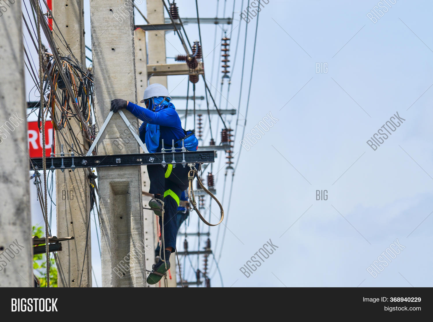 Electricians Climbing Image & Photo (Free Trial) | Bigstock