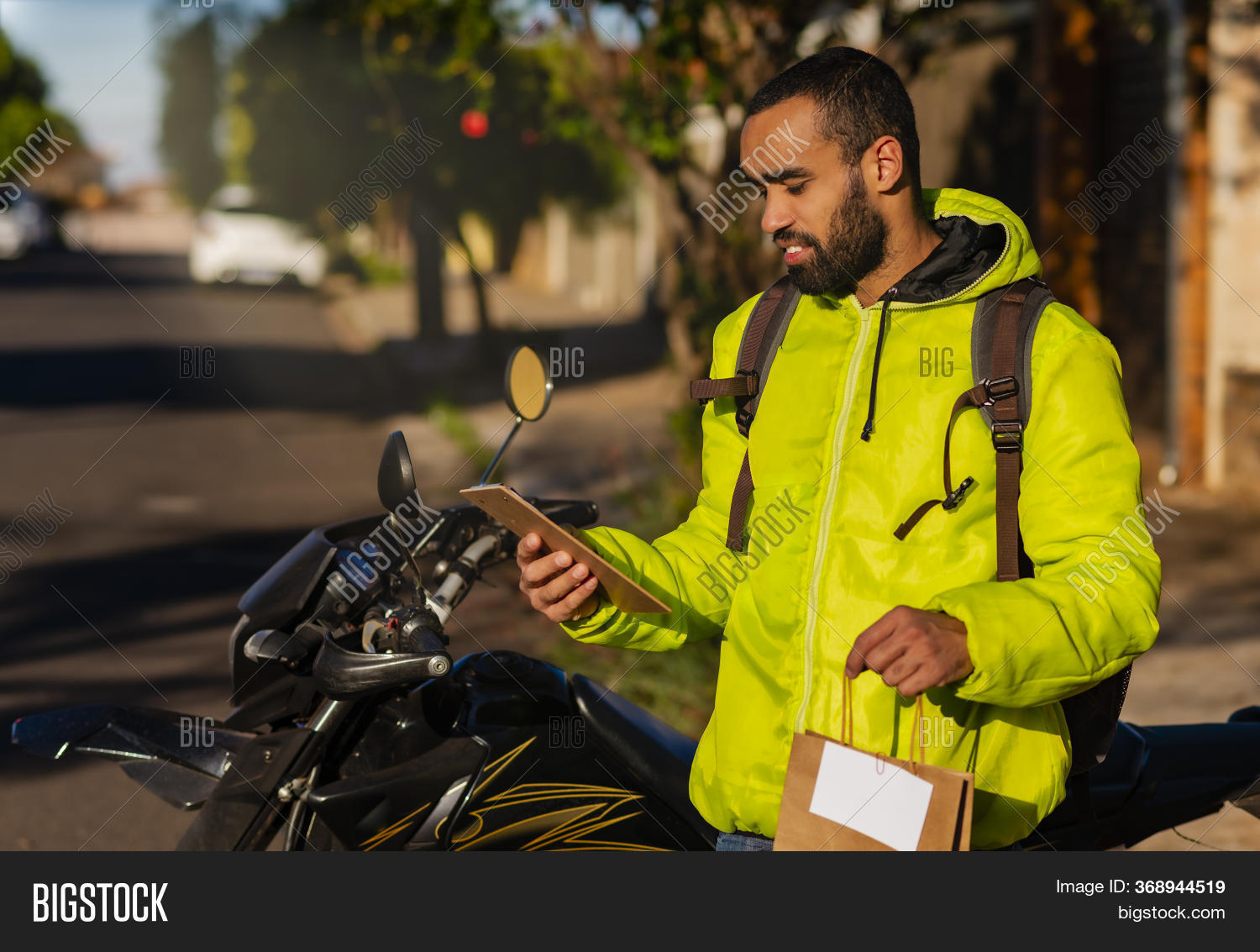 Delivery Man Checking Image & Photo (Free Trial) | Bigstock
