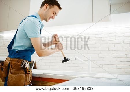 Male Plumber Uniform Image & Photo (Free Trial) | Bigstock