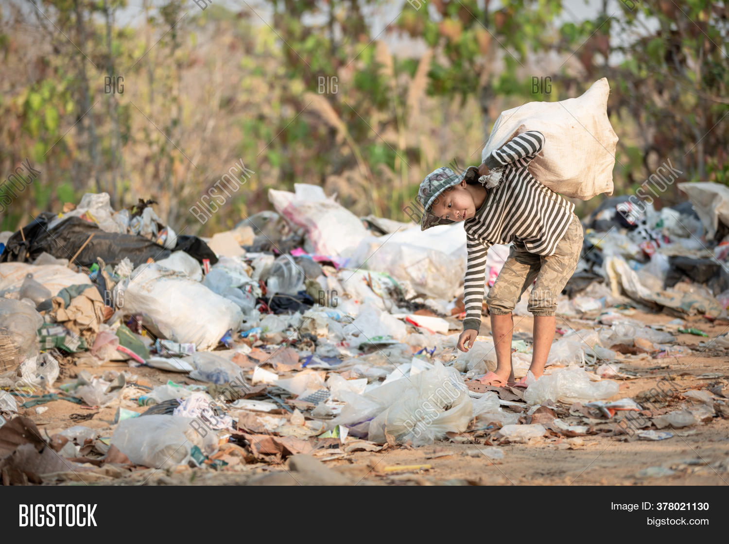 Poor Boy Collecting Image & Photo (Free Trial) | Bigstock