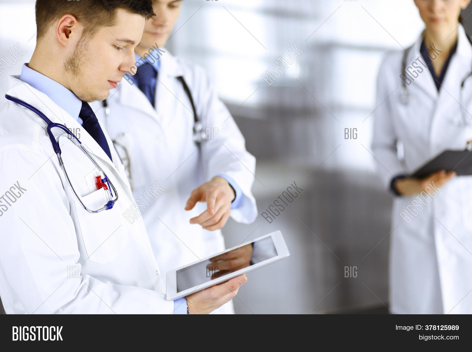 Group Doctors Checking Image & Photo (Free Trial) | Bigstock